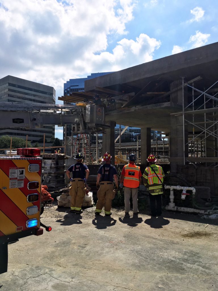 Firefighters Remove Injured Construction Worker From Collapse of ...